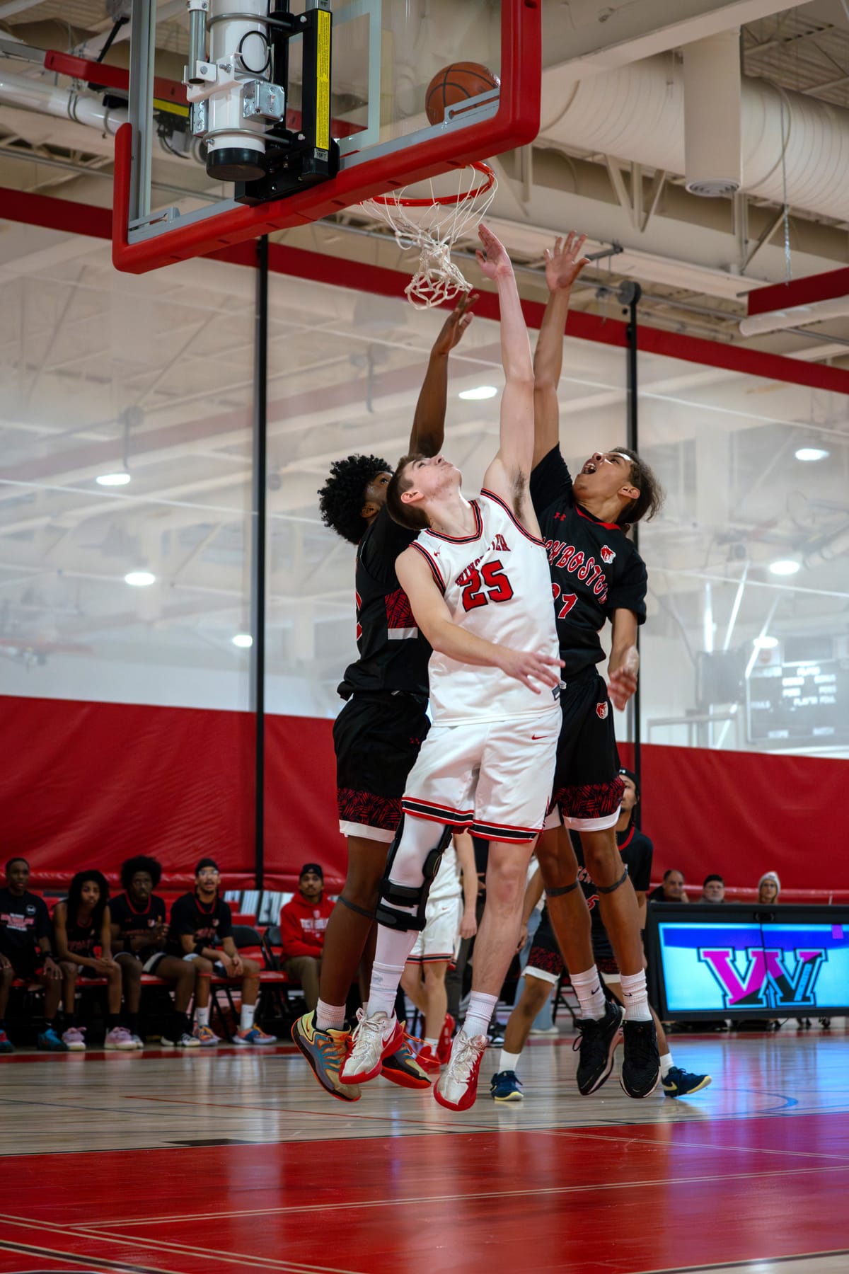 Winchester boys basketball begins new year with two more wins, girls ...